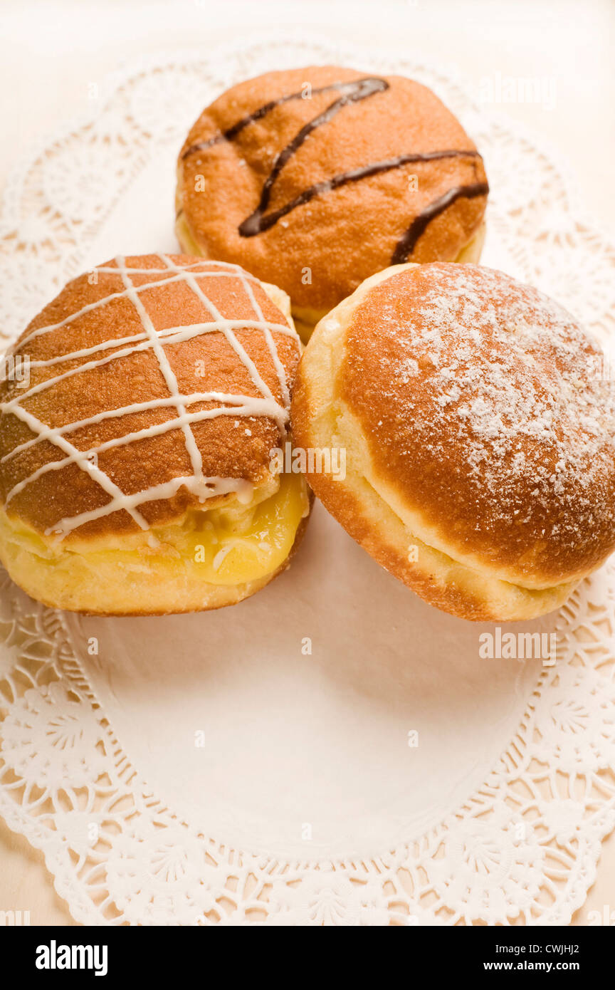 fresh baked doughnuts on display Stock Photo - Alamy