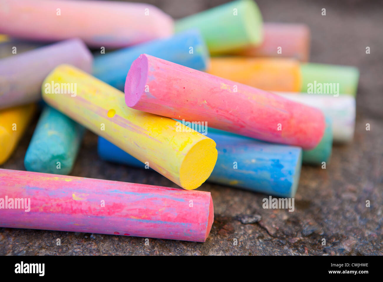 Close-up of colorful crayons outdoors for drawing Stock Photo - Alamy