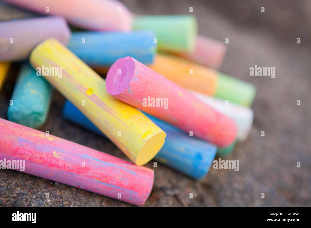 Close-up of colorful crayons outdoors for drawing Stock Photo - Alamy