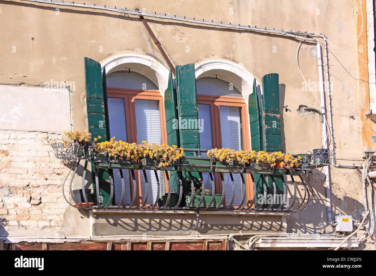 Italy. Venice. The streets of the city. Windows with flowers Stock ...