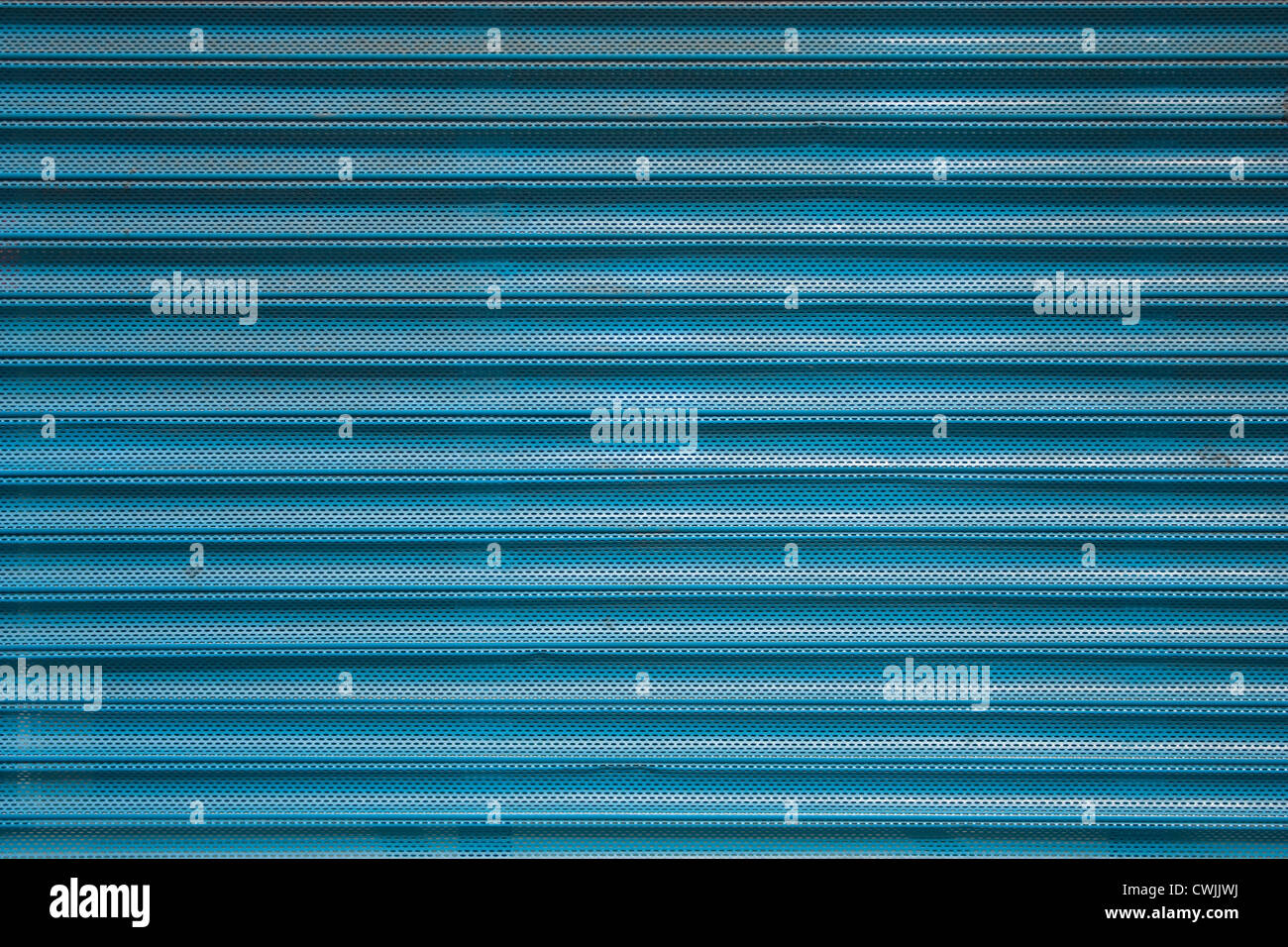 Blue Shopfront Roll Shutter Stock Photo - Alamy