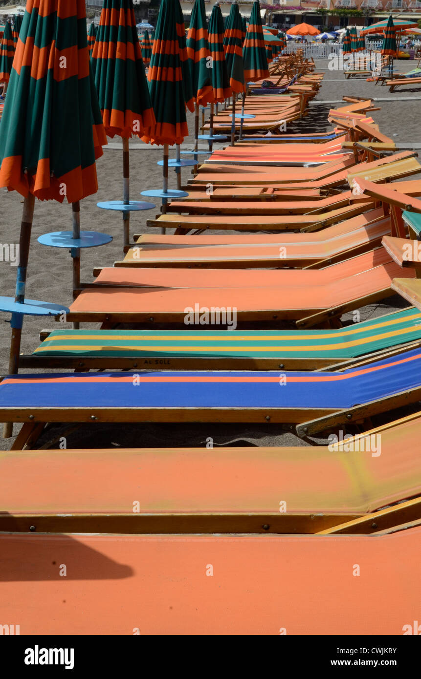 Sunbeds on Positano beach, Italy Stock Photo - Alamy
