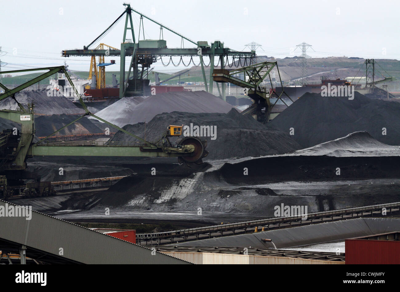 iron ore in bulk on the quayside at Rotterdam, awaiting loading Stock ...