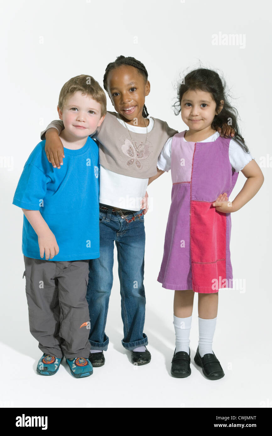 Multiracial group of children smiling Stock Photo - Alamy