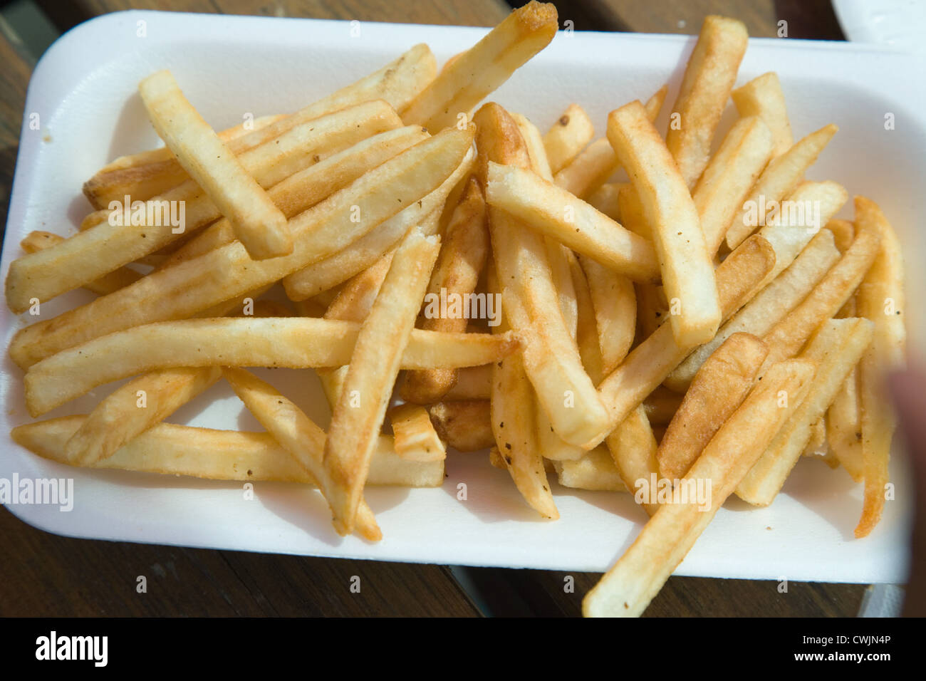 Carton of takeaway chips Stock Photo - Alamy