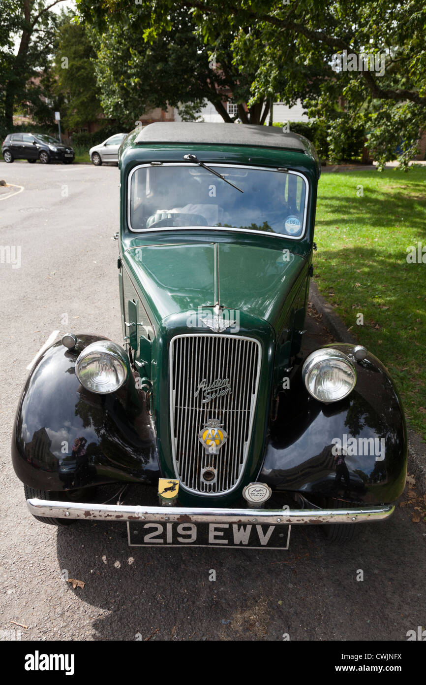 front view of Green Austin Seven old motor car with original AA Badge ...