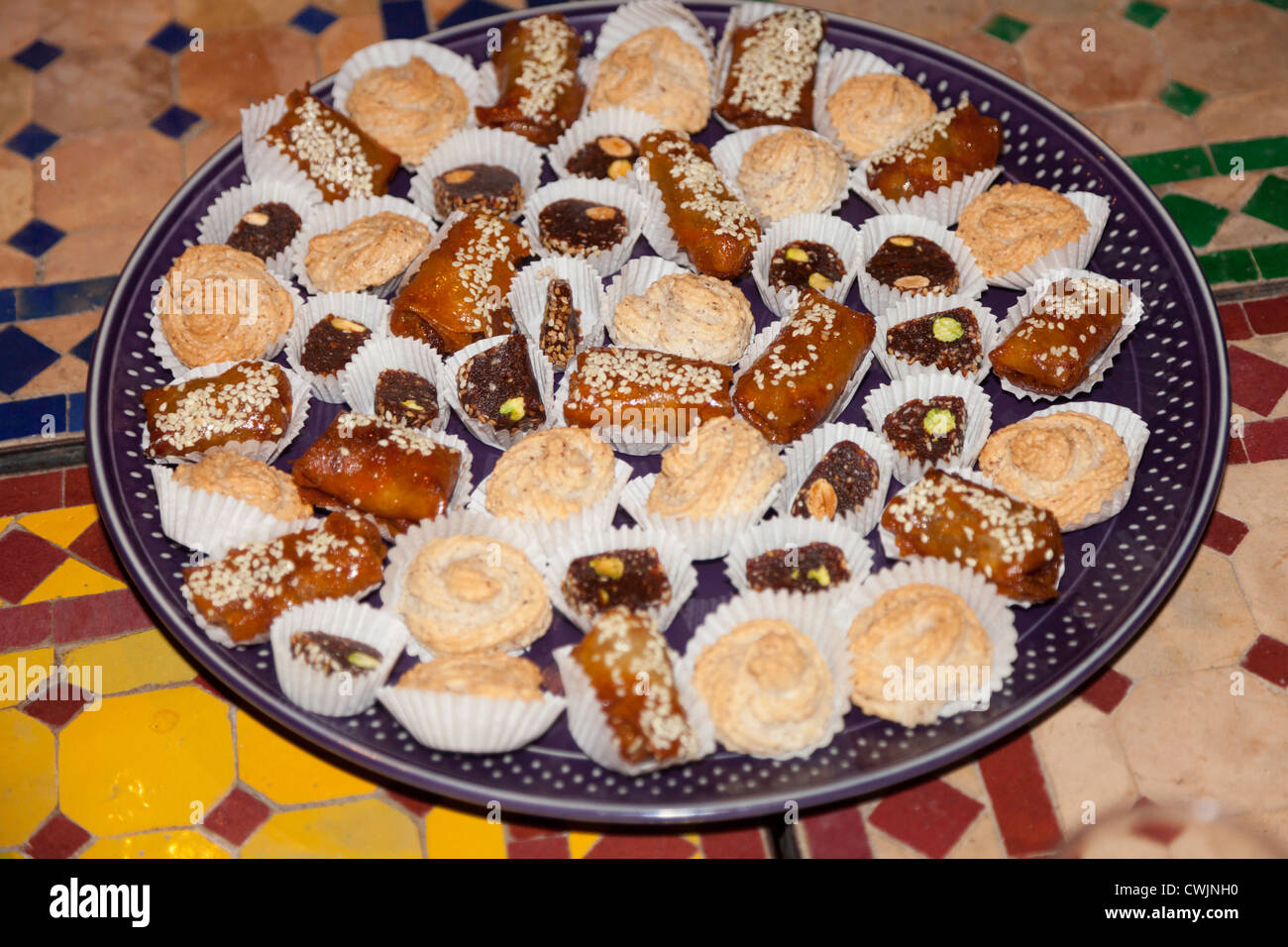 Plate of petit fours Stock Photo - Alamy