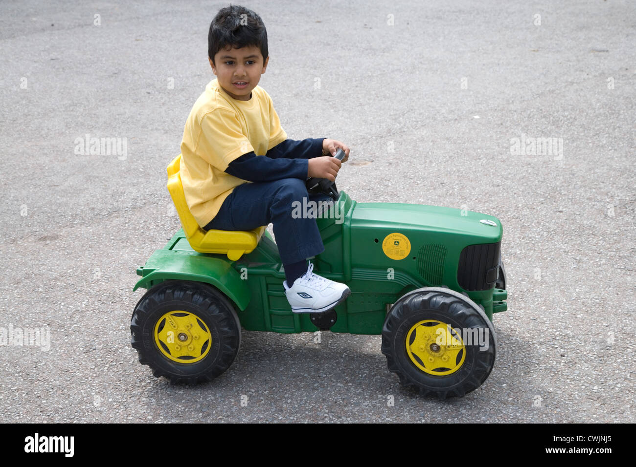 Ride on toy tractor hi-res stock photography and images - Alamy