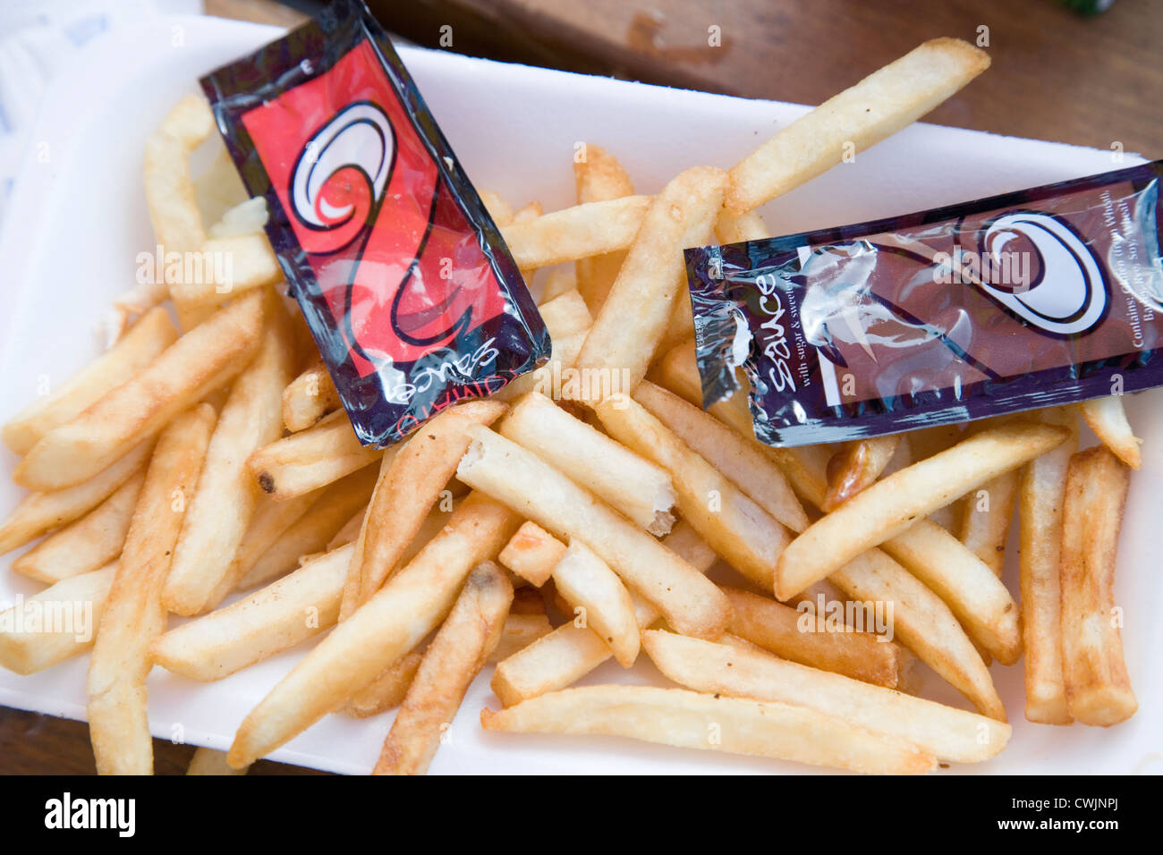 Carton of chips Stock Photo - Alamy