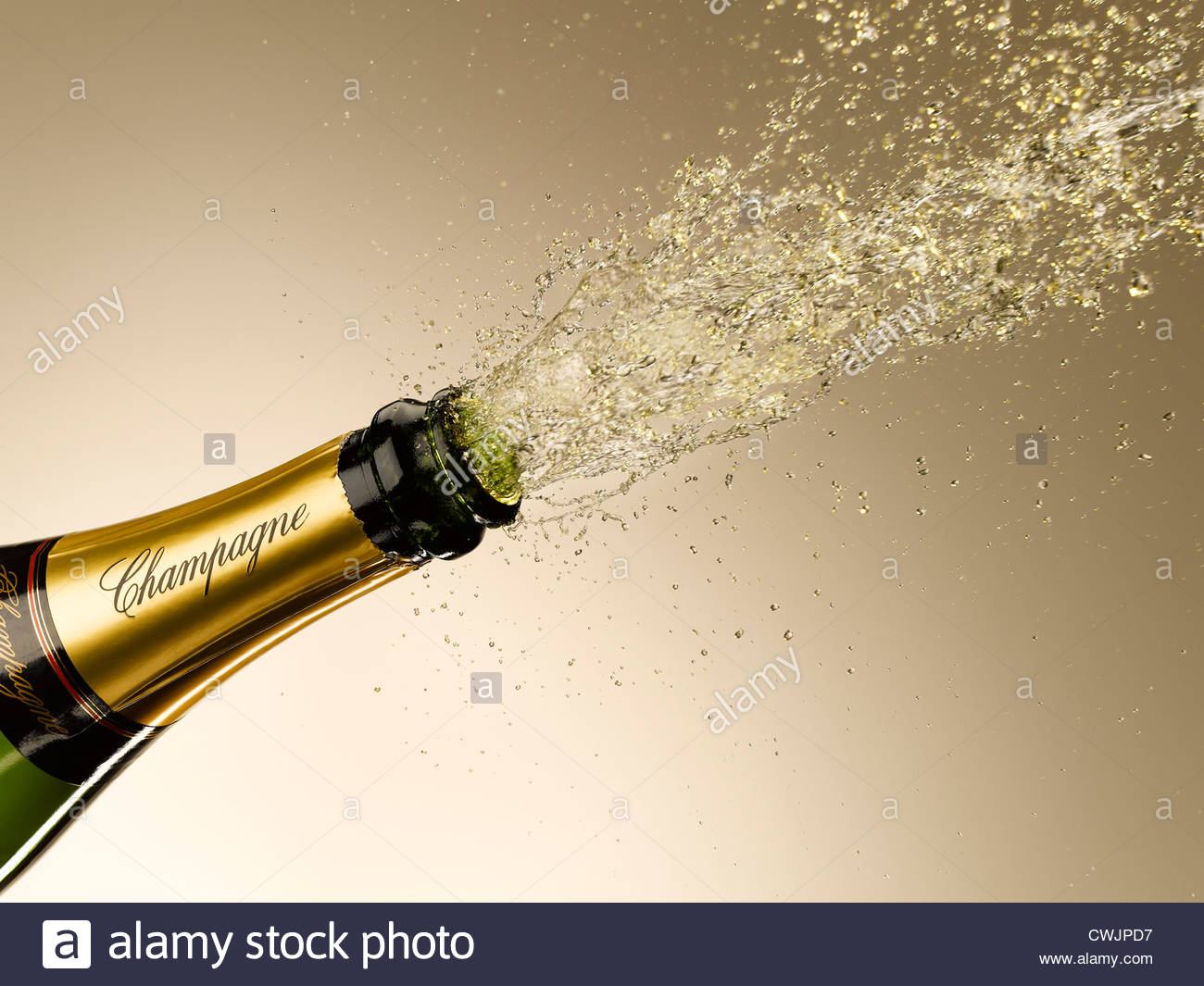 Champagne Bottle Exploding Stock Photos & Champagne Bottle Exploding ...