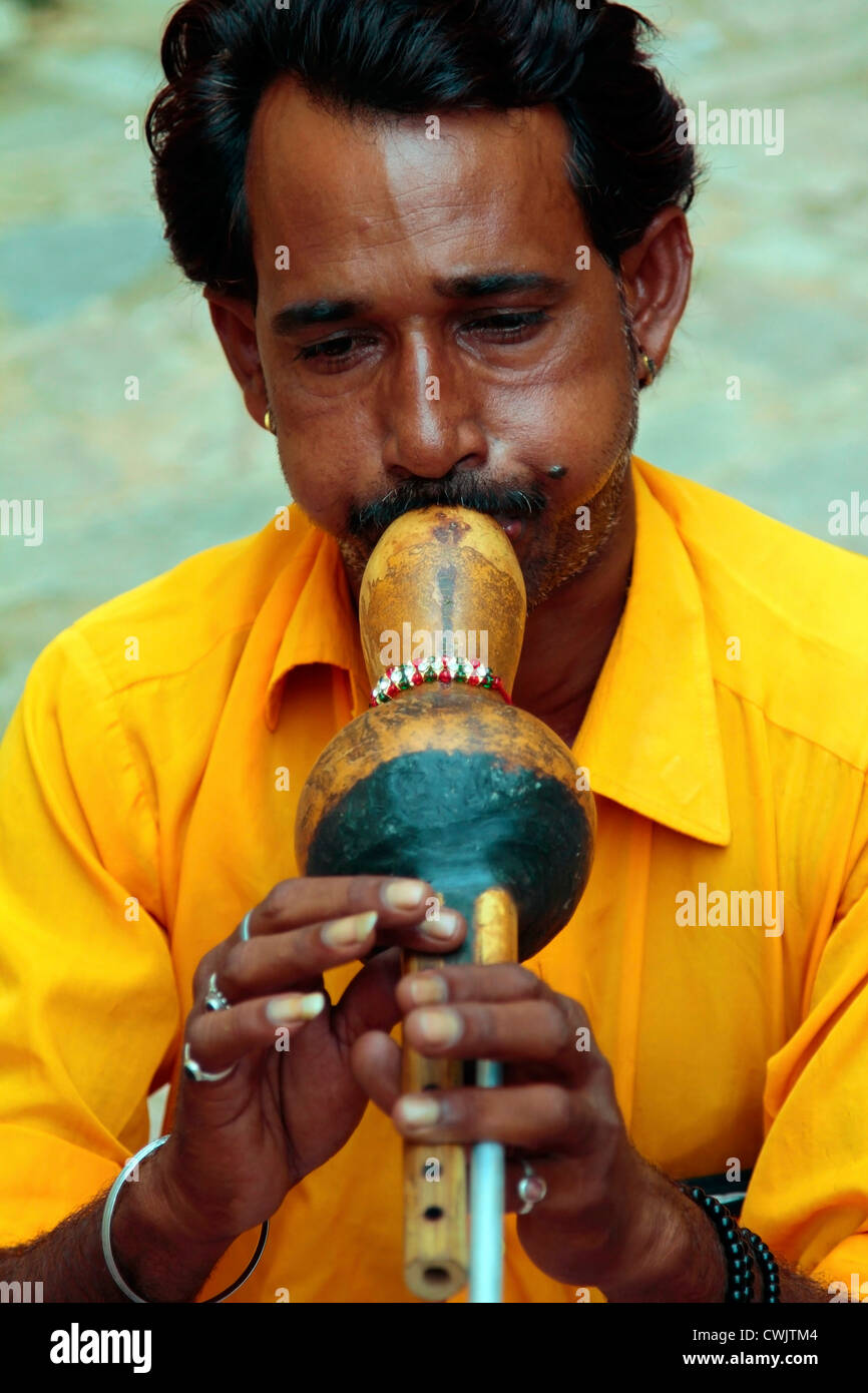 Snake Charmer playing Flute music Stock Photo - Alamy