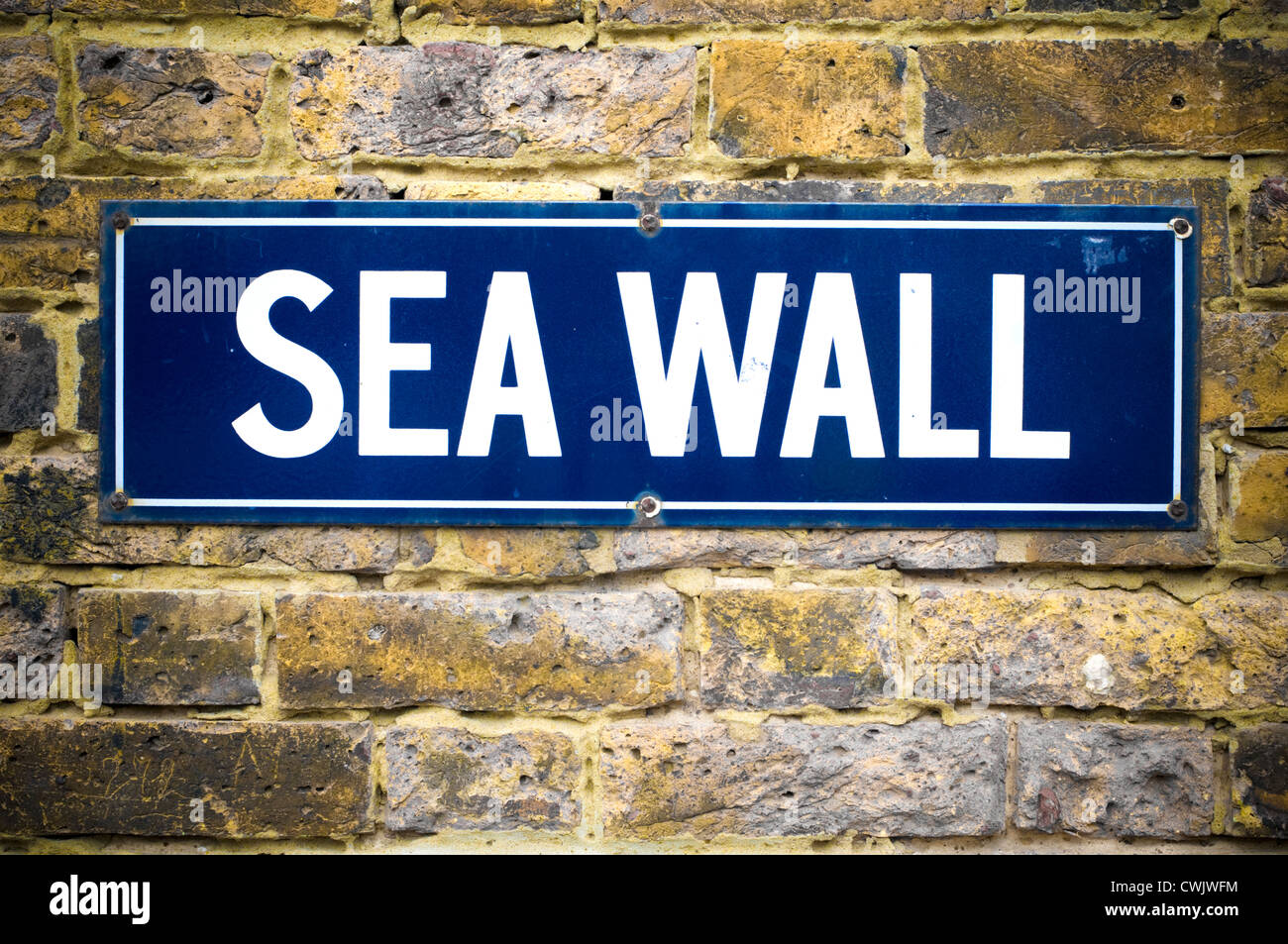 Sea Wall - old street sign, Whitstable, Kent Stock Photo - Alamy