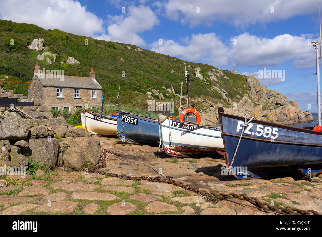 Fishing boats on the cobbled causeway at Penberth in Cornwall Stock ...