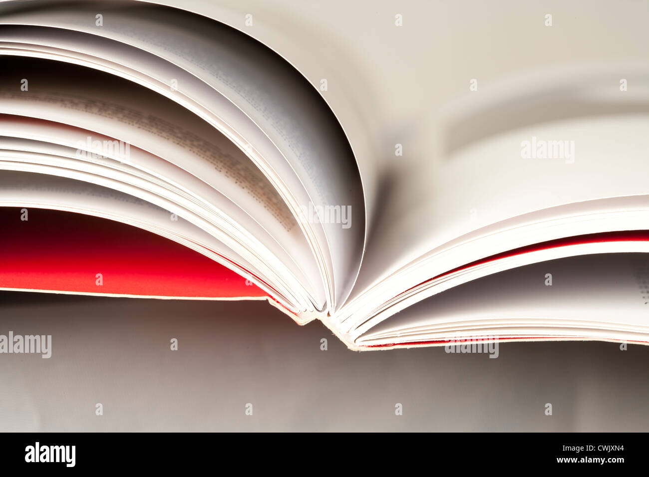 Close up of open book Stock Photo - Alamy