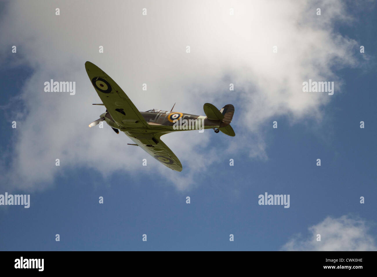 Blue sky and clouds spitfire flying hi-res stock photography and images ...