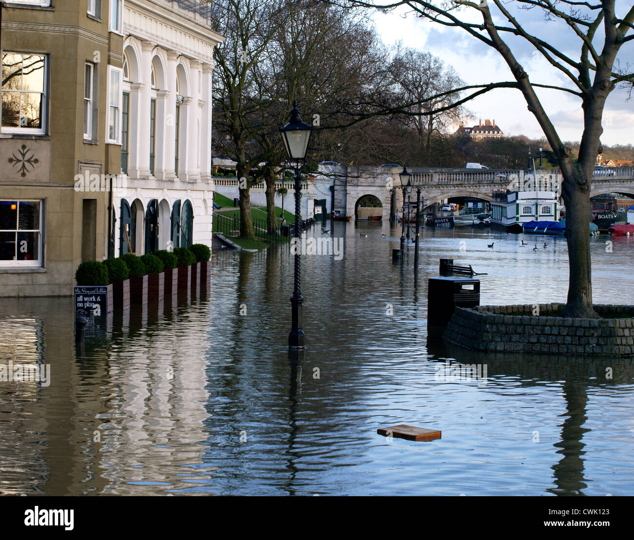 High tide causes flooding along the River Thames and restricts access ...