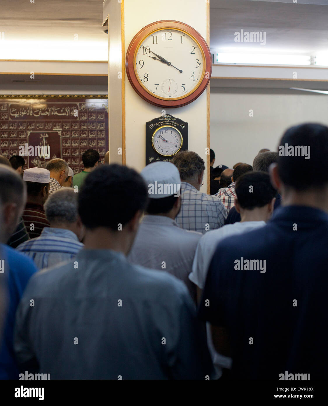 Muslim-American men perform evening prayers at the Islamic Society of ...