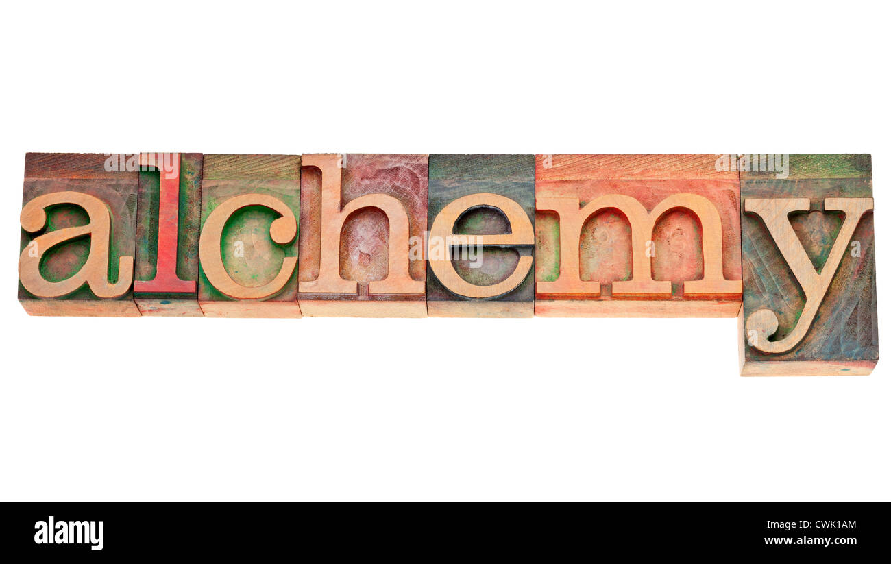alchemy - isolated word in vintage letterpress wood type stained by ...