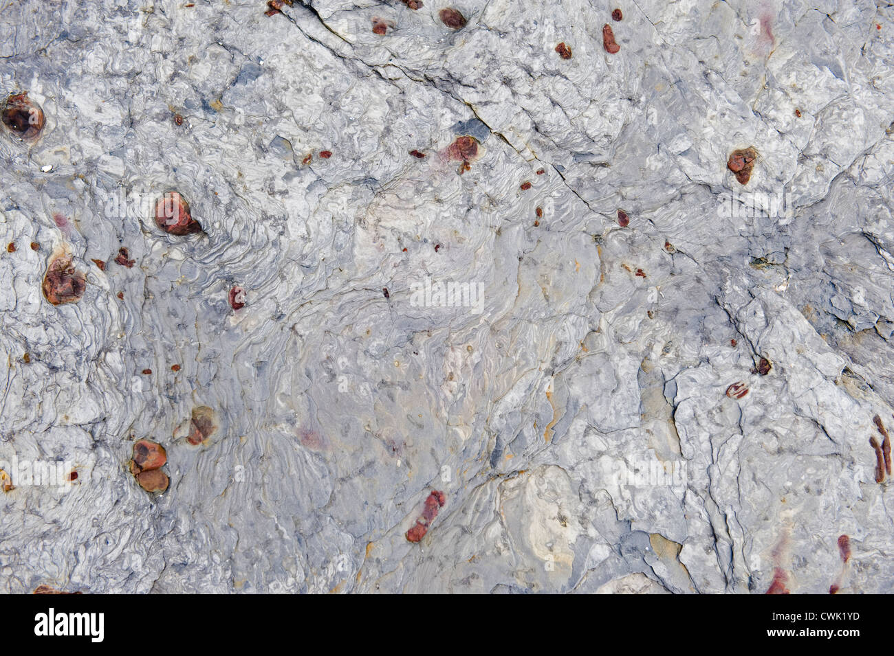 Rust spots in rock Stock Photo - Alamy