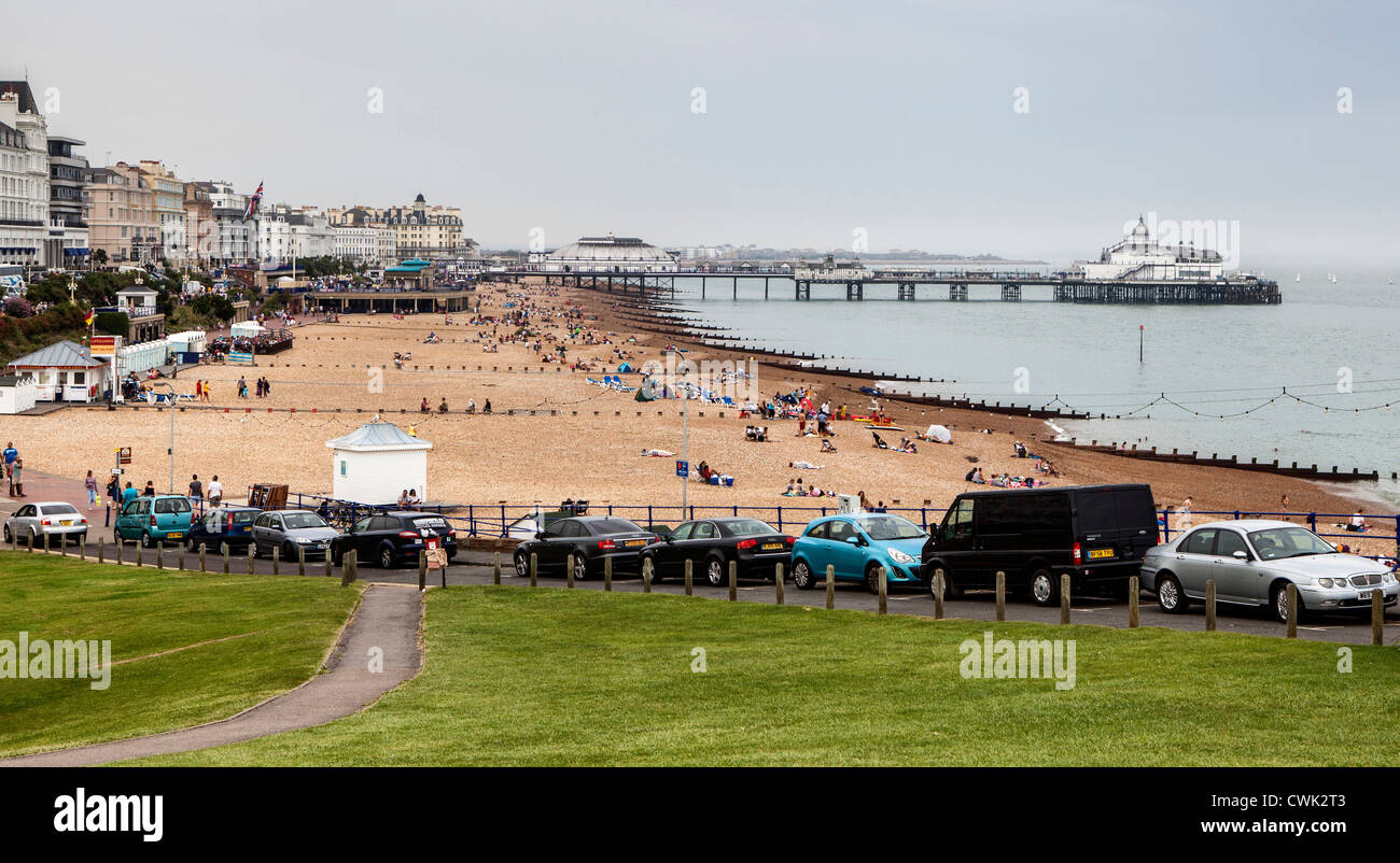 A view of people enjoying the beach at Eastbourne on a beautiful Summer ...