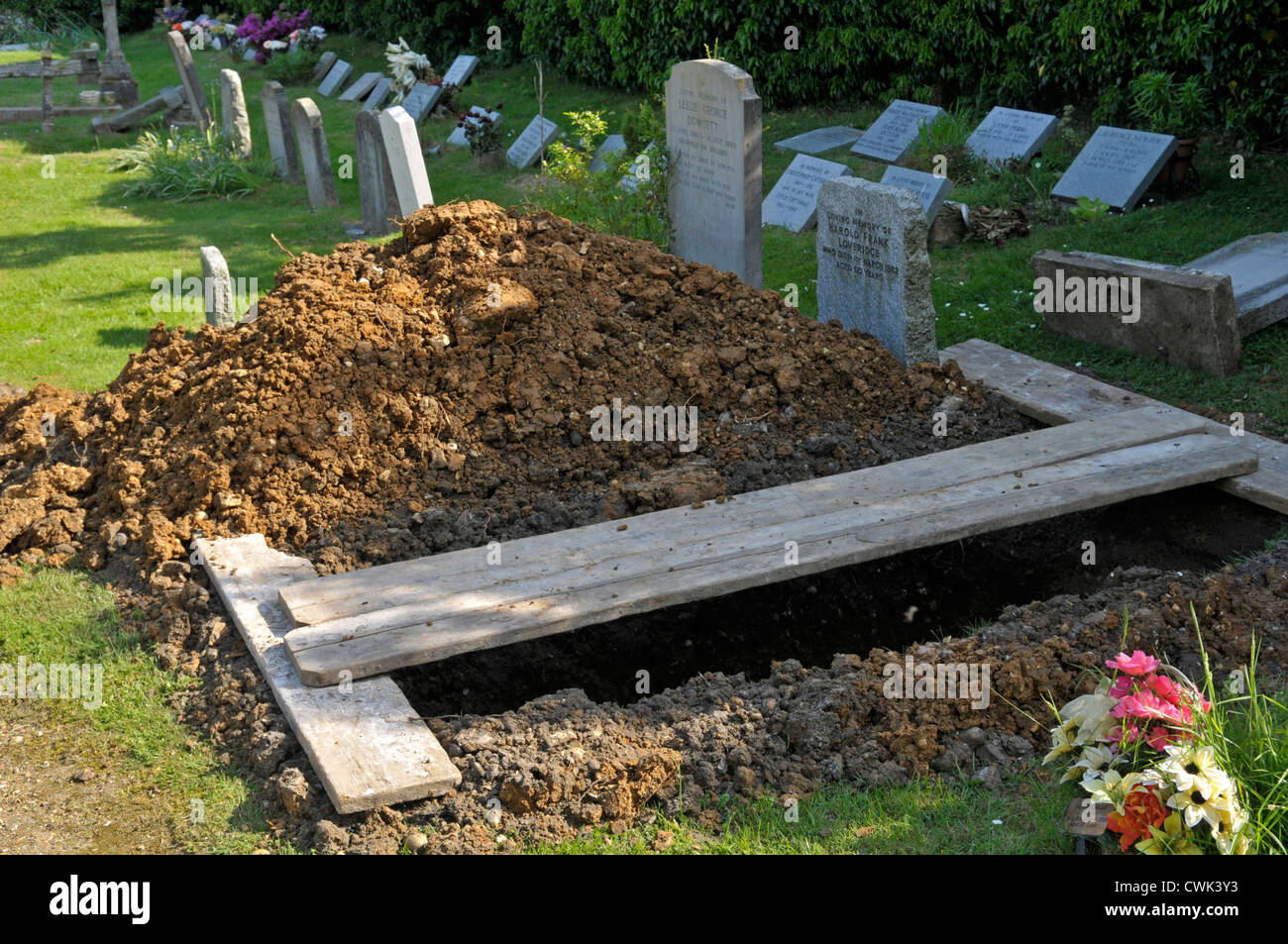 Fresh Dug Grave At Funeral
