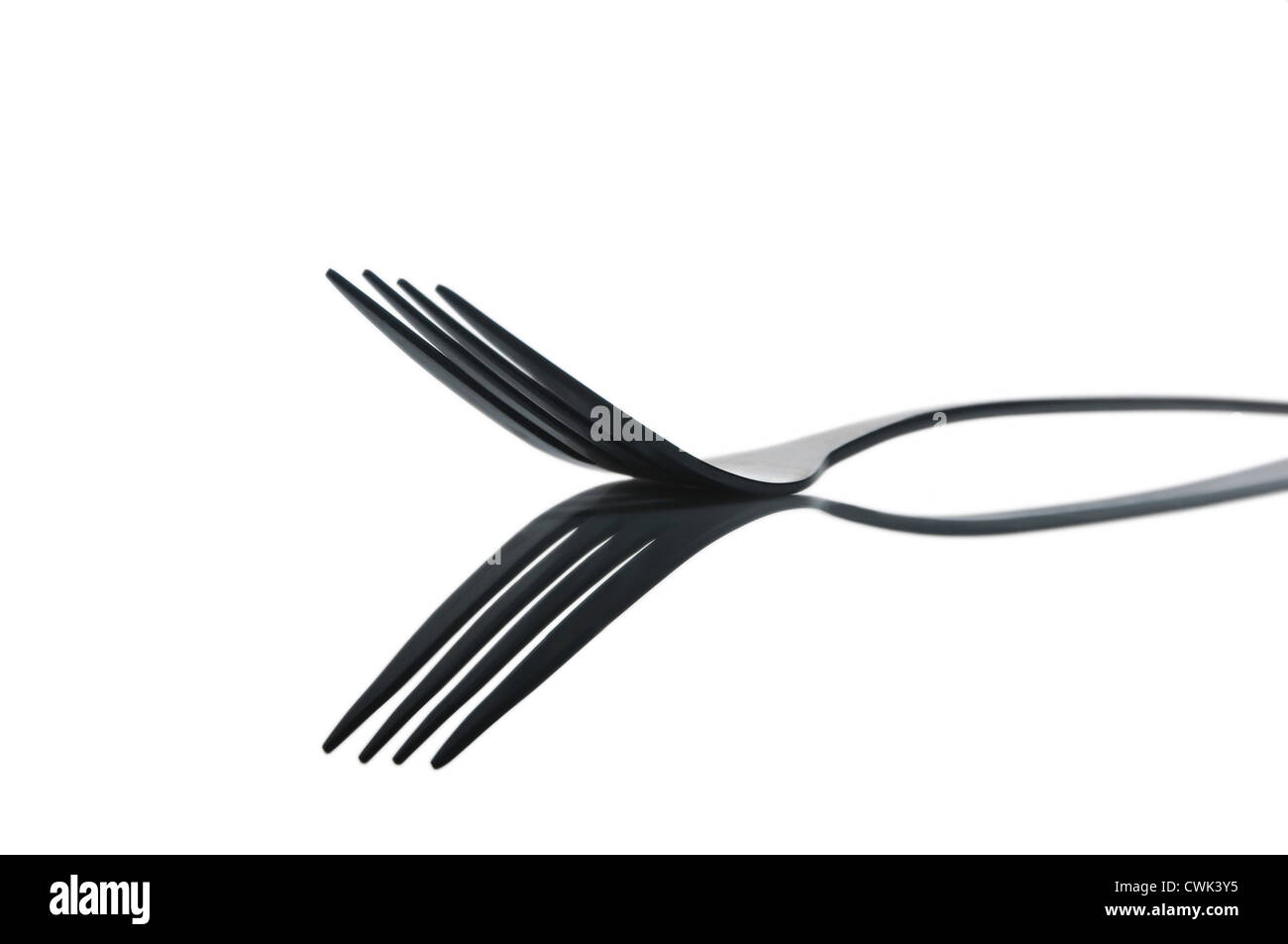 Close up of fork with reflection; isolated on white Stock Photo - Alamy