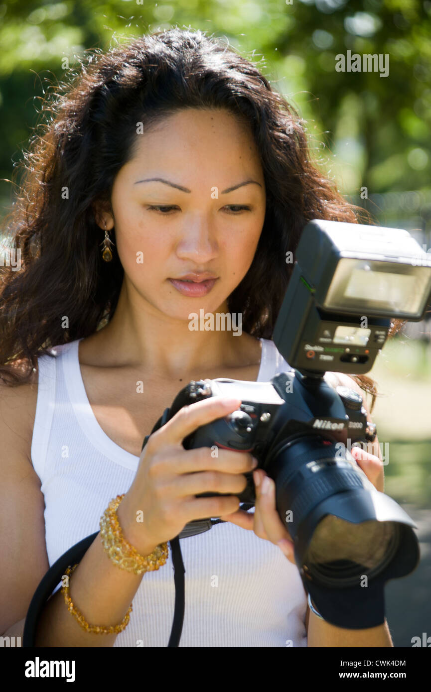 Asian woman taking photo hi-res stock photography and images - Alamy