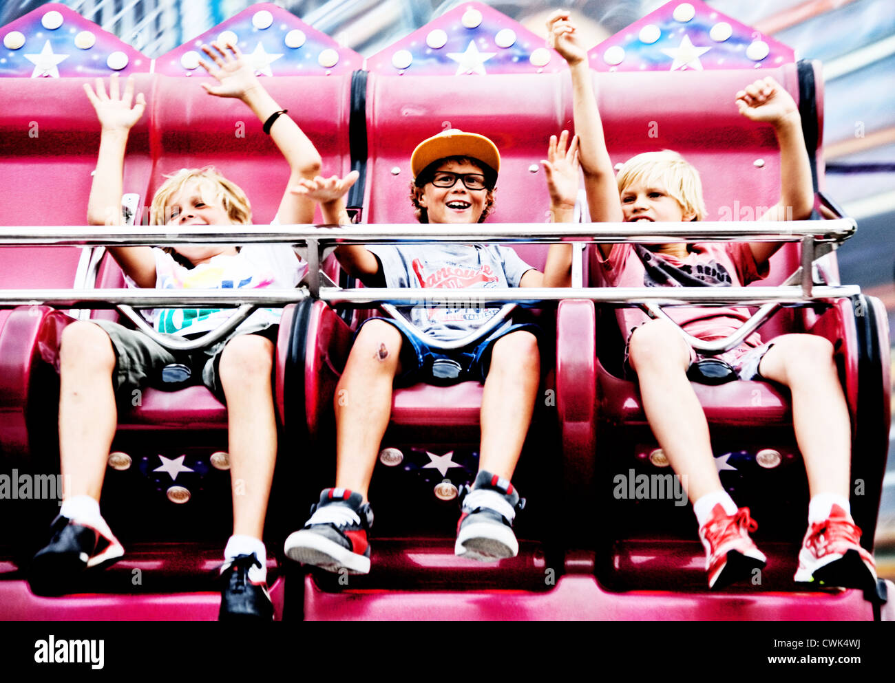 Kids having fun at the village fair Stock Photo - Alamy
