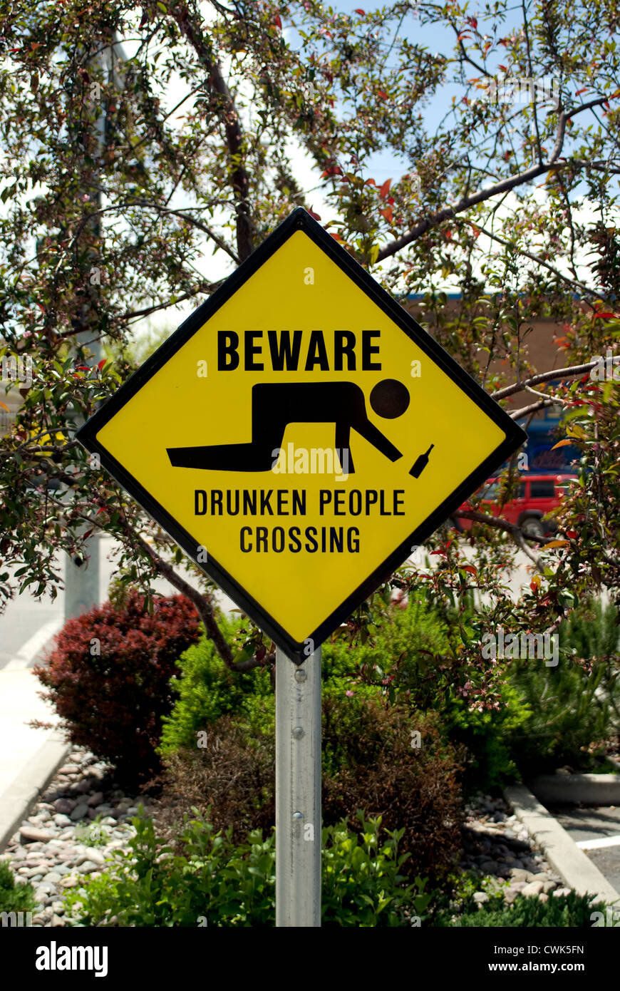 Traffic sign warning for drunken people crossing the street, possibly ...