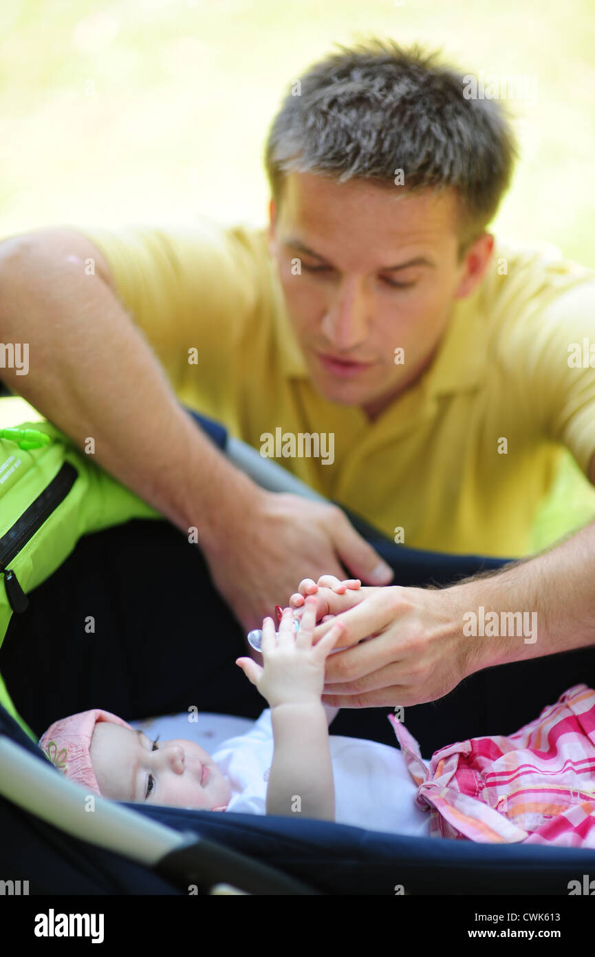 Man and a baby Stock Photo - Alamy