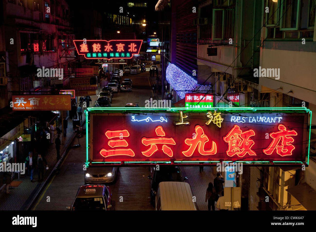 Asia, China, Hong Kong. Neon signs at night in Hong Kong Stock Photo ...