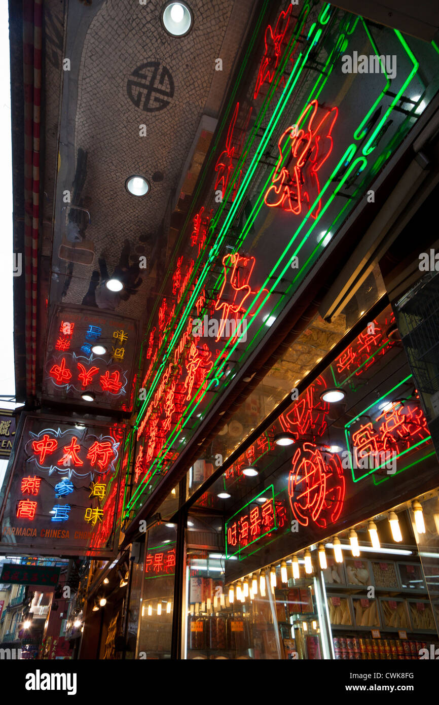 Asia, China, Macau. Neon signs along the streets of downtown Macau ...