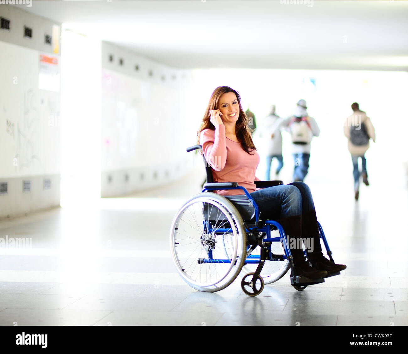 Woman in wheelchair hi-res stock photography and images - Alamy