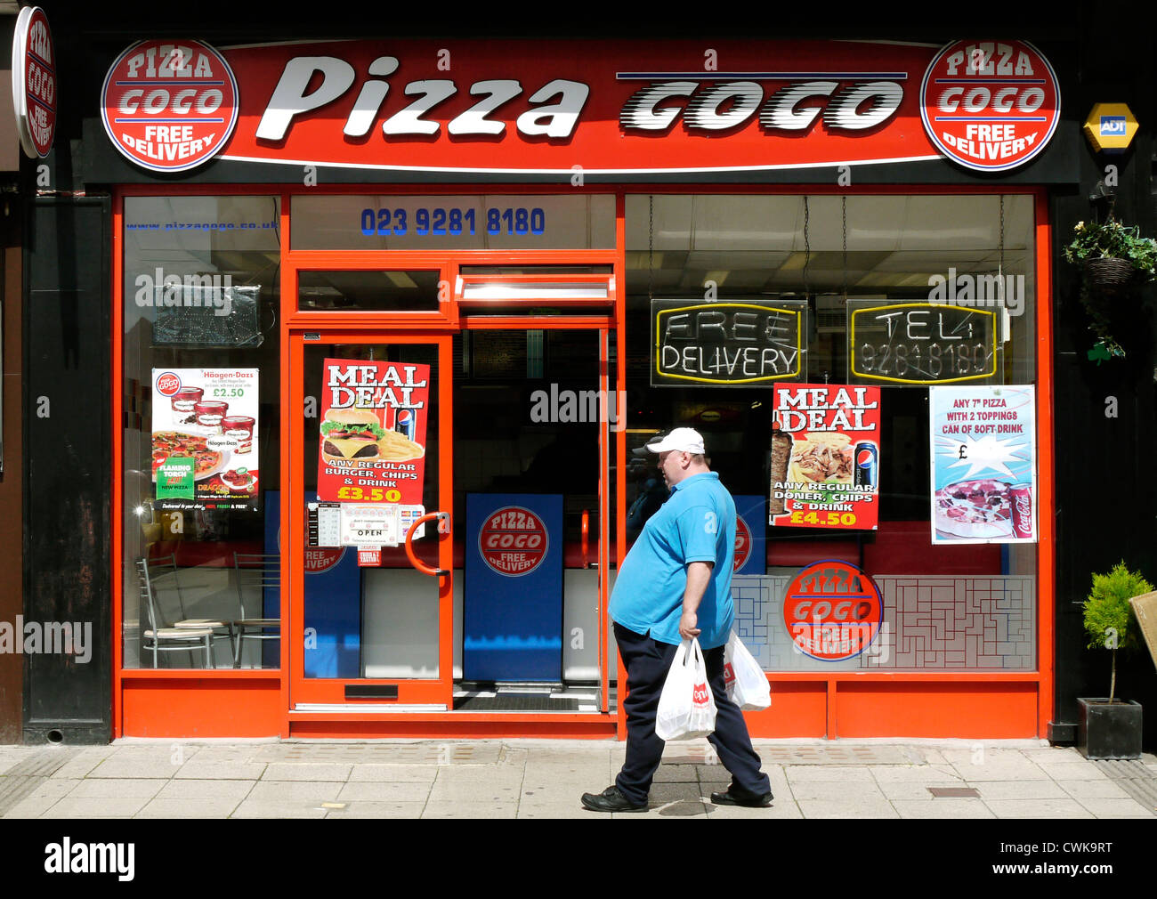 Fat man walking hi-res stock photography and images - Alamy