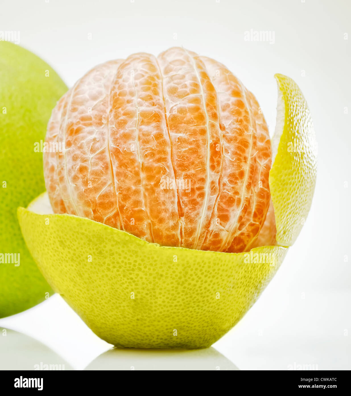 Close up of ripe pomelos on white background Stock Photo - Alamy