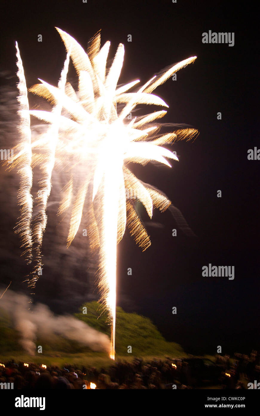 Fire works exploding against dark sky Stock Photo - Alamy