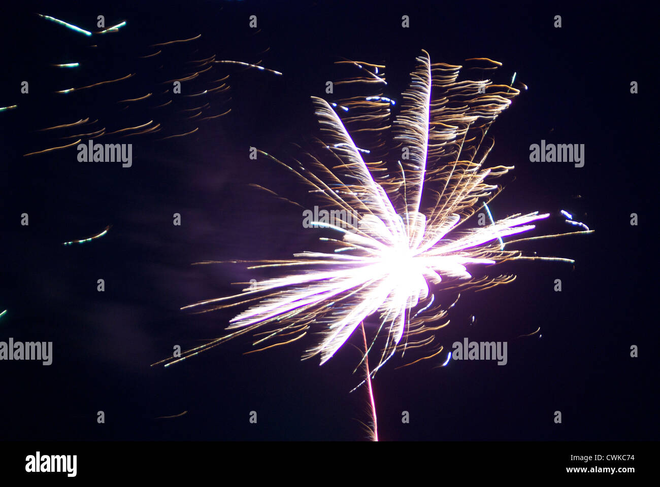 Fire works exploding against dark sky Stock Photo - Alamy