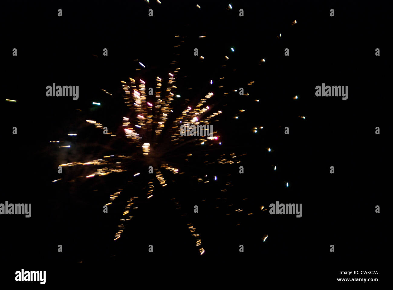Fire works exploding against dark sky Stock Photo - Alamy