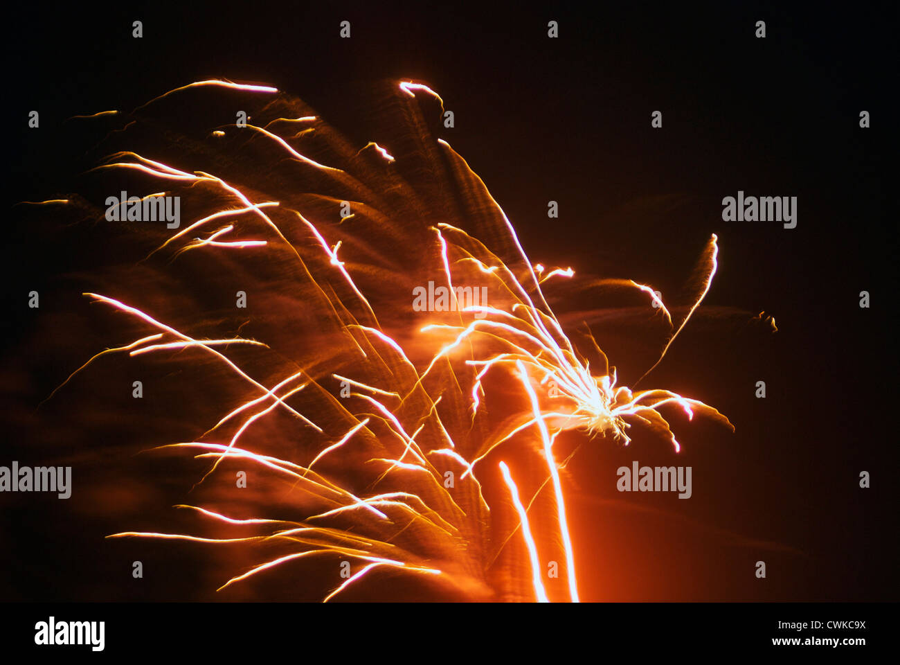 Fire works exploding against dark sky Stock Photo - Alamy