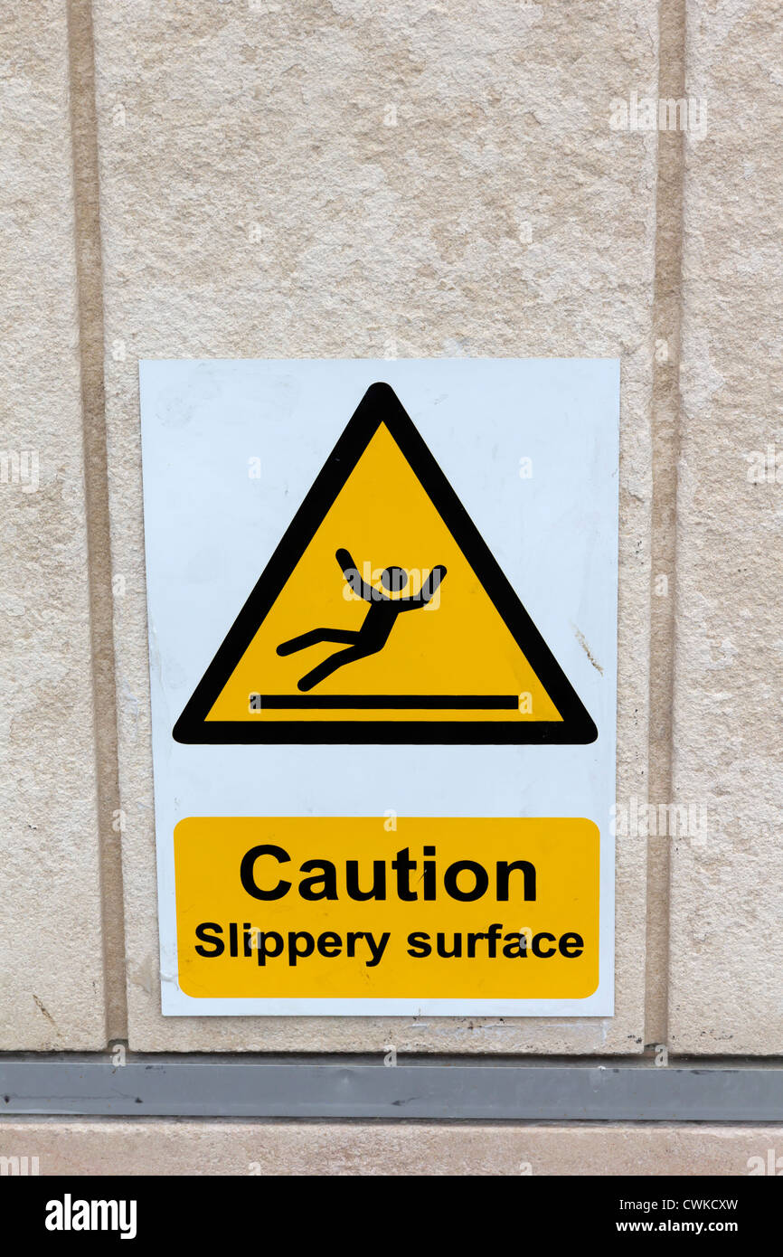Caution slippery surface sign in Brighton Stock Photo - Alamy Caution slippery surface sign in Brighton Stock Photo - Alamy