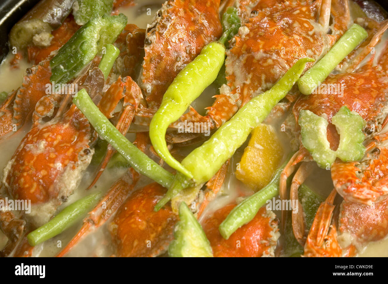 Crabs cooked in coconut milk Stock Photo - Alamy