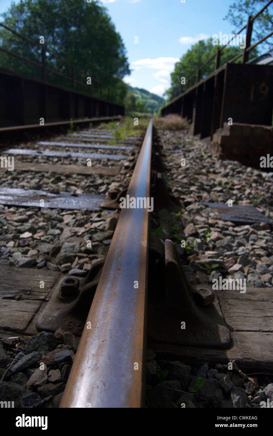 View along a railway line track Stock Photo - Alamy
