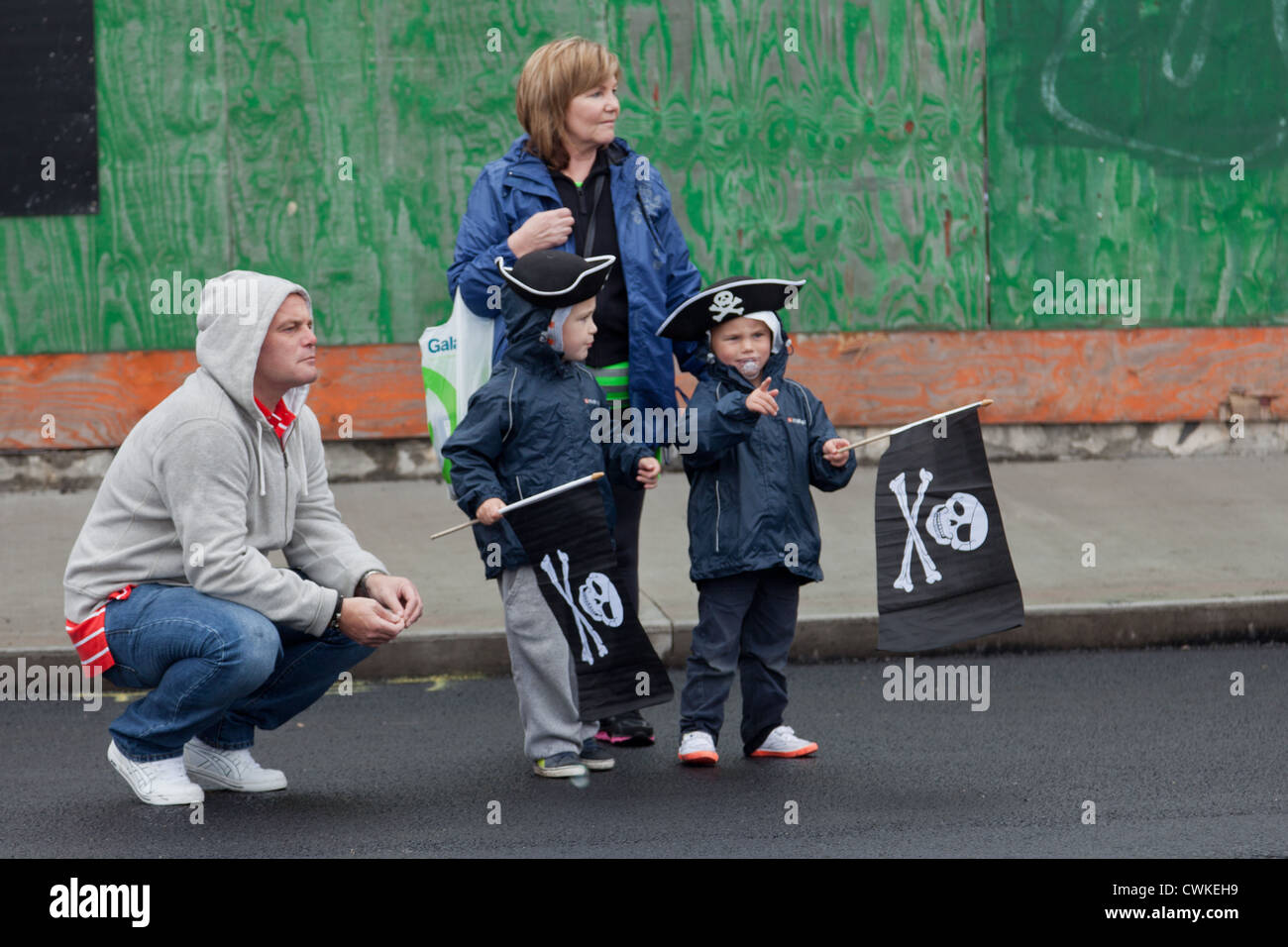 Family Watches Procession Stock Photo - Alamy