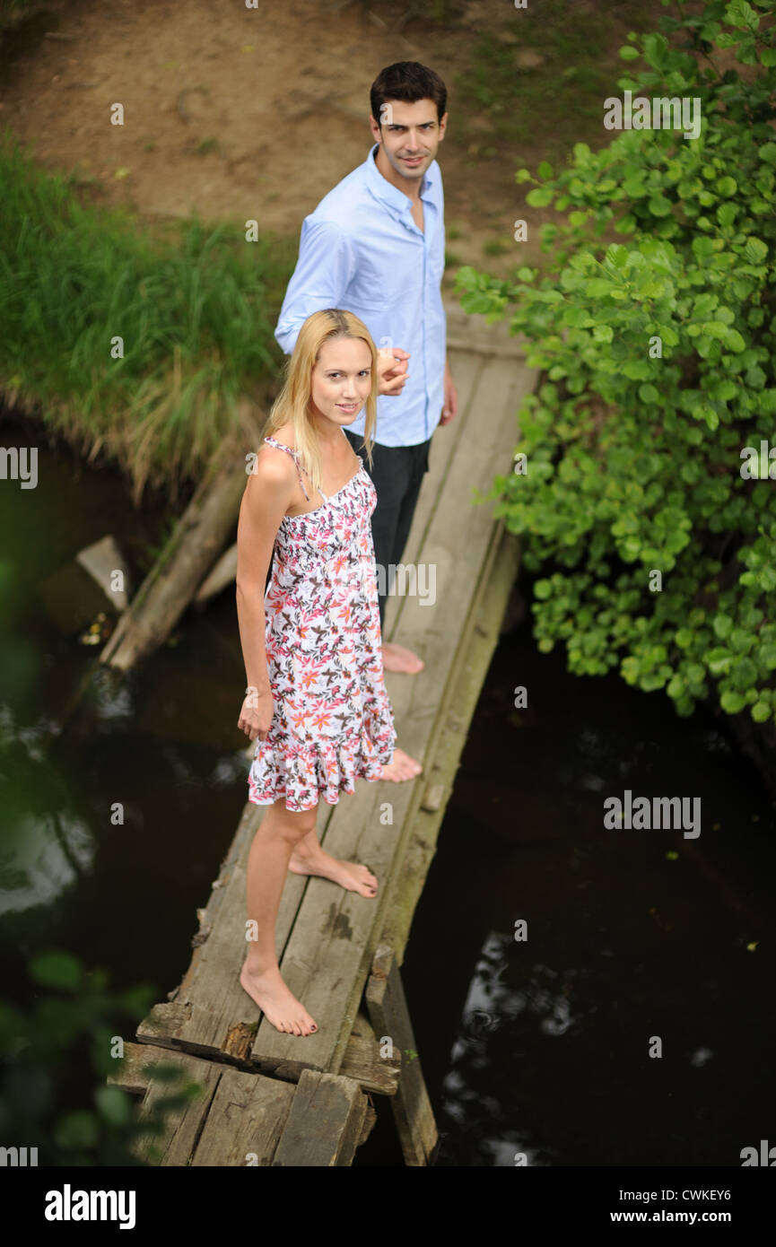 Wooden bridge two men hi-res stock photography and images - Alamy