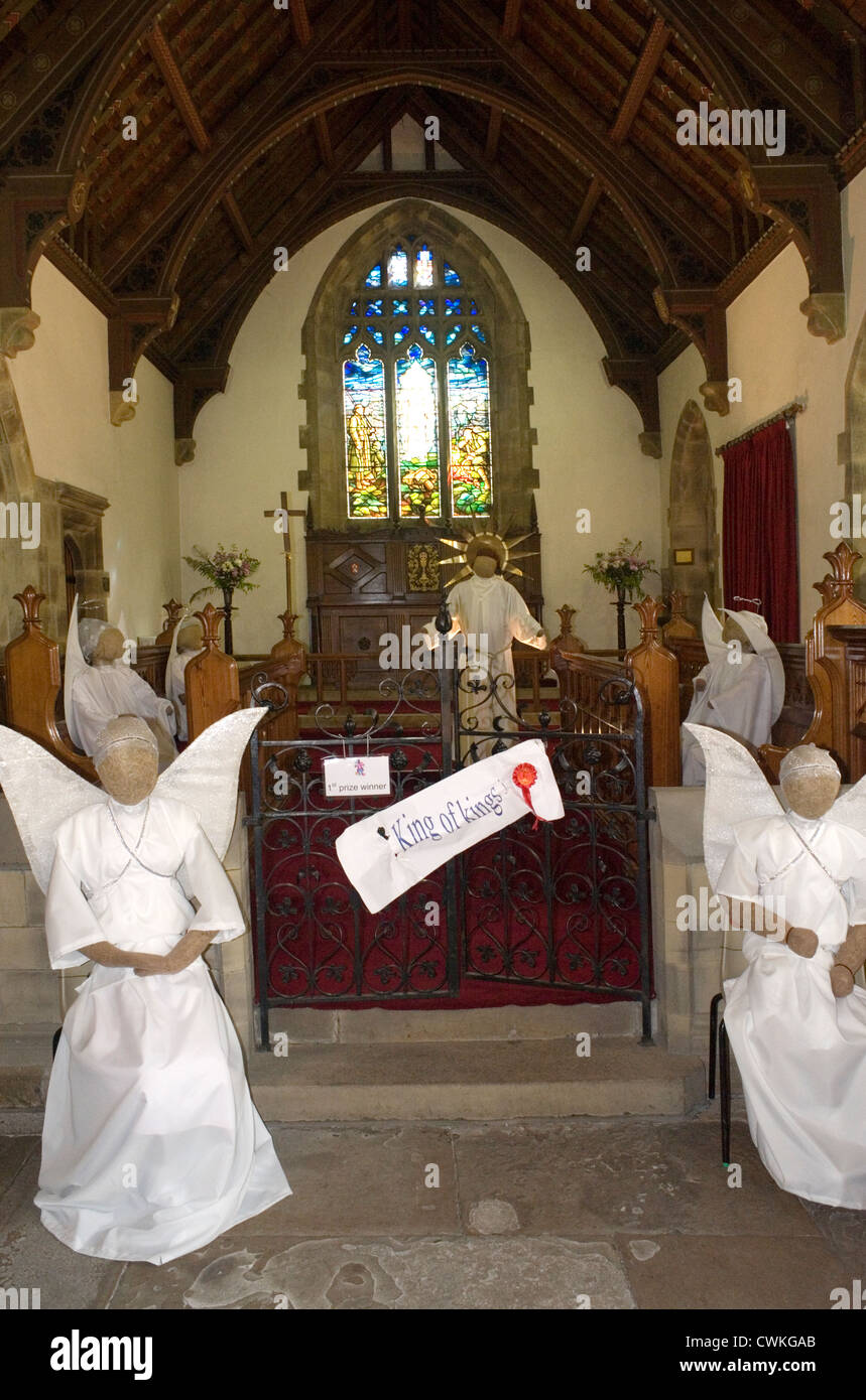 scarecrows at kettlewell festival depicting group of angels in church ...