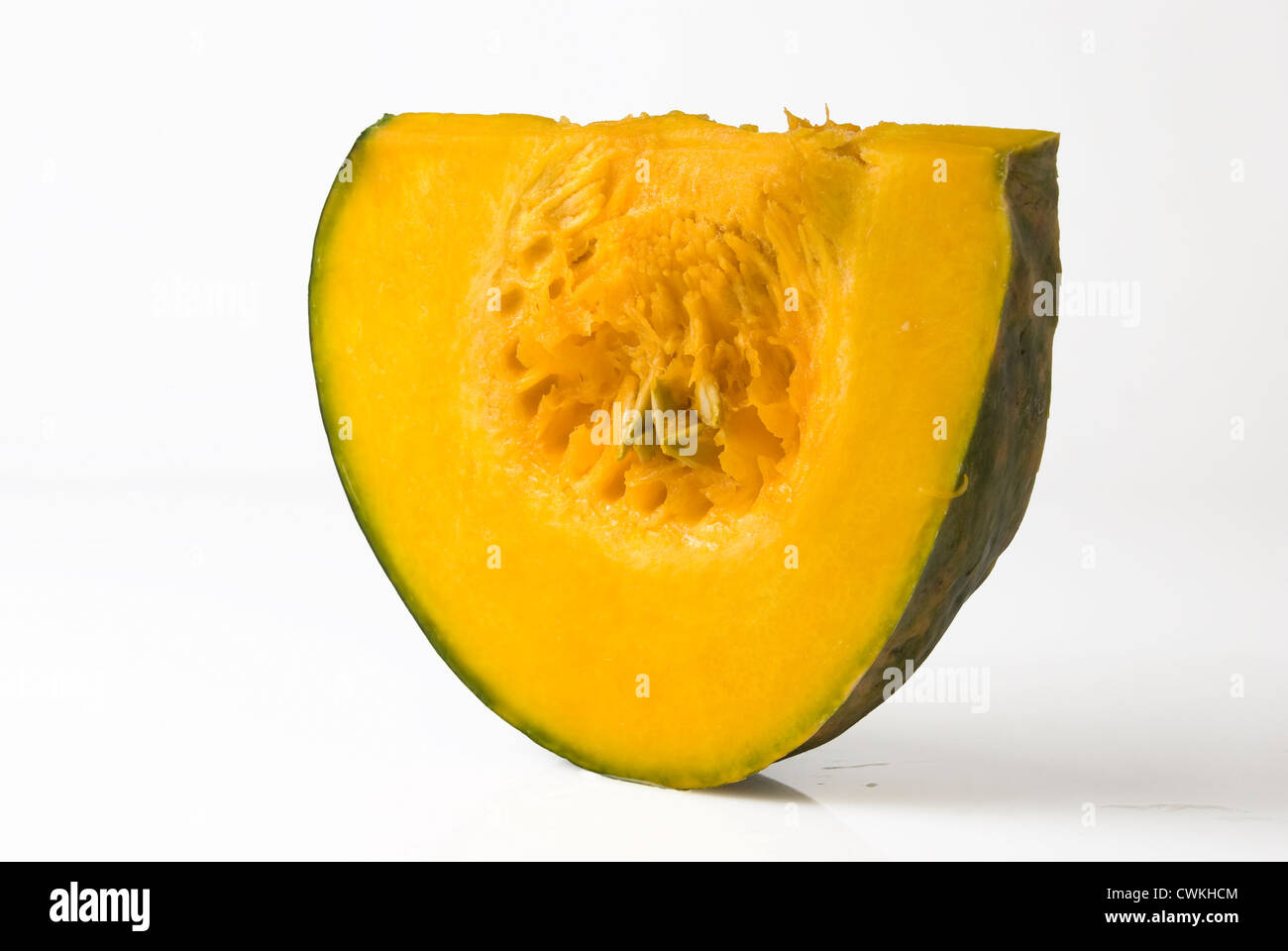A slice of squash against white background Stock Photo - Alamy