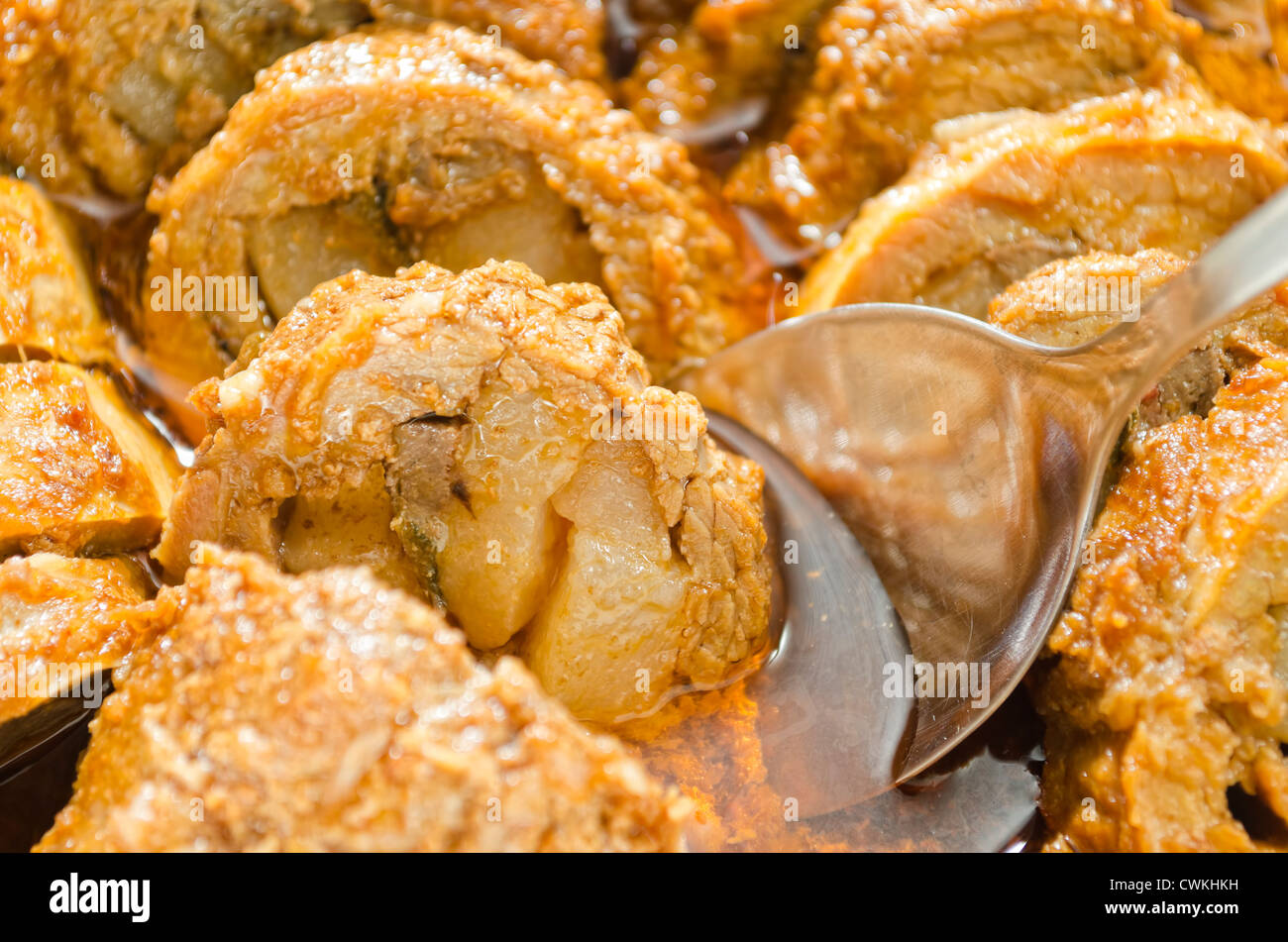 Philippine tomato-based meat dish with pure pork fat filling Stock ...