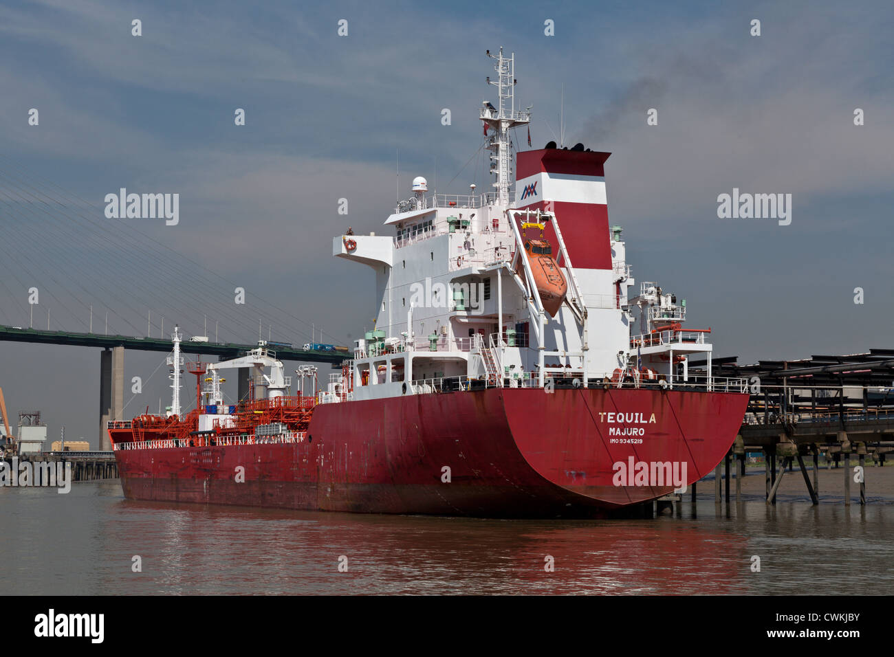 Oil tanker berthed on the River Thames near the Queen Elizabeth II ...