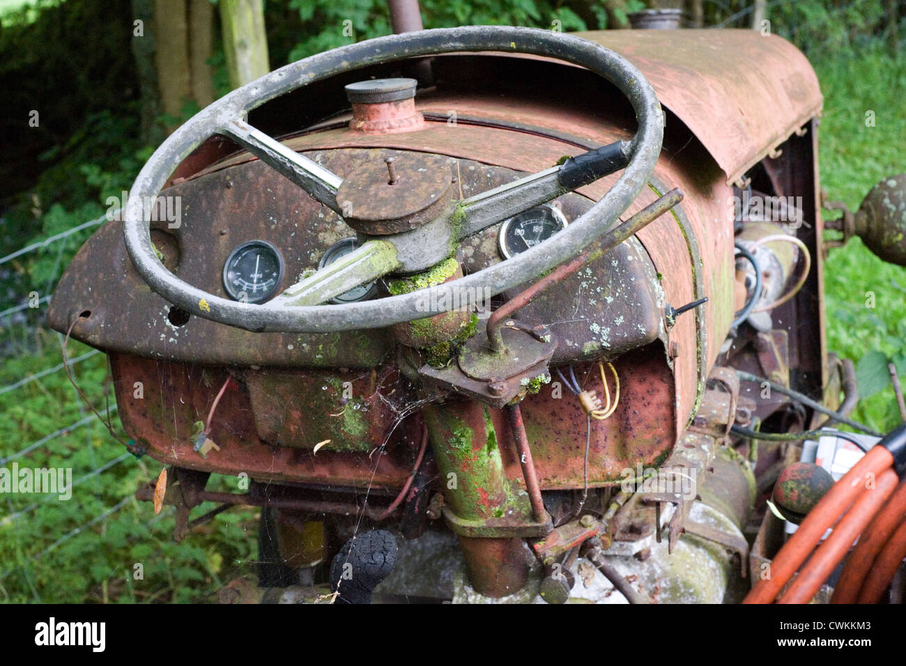 old abandoned rusting tractor in farmers field Stock Photo - Alamy