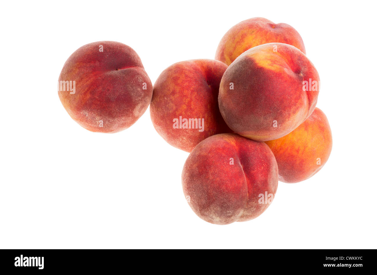 Group of yellow peaches ripe ready and isolated Stock Photo - Alamy